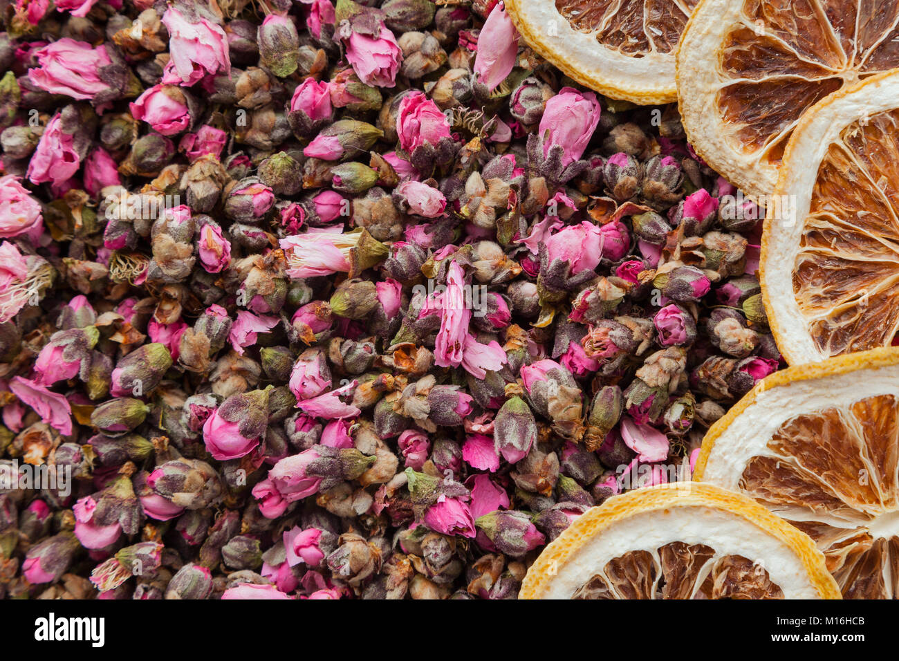 Tea flowers texture. Peach blossom tea with lemon. Organic dried flower ...