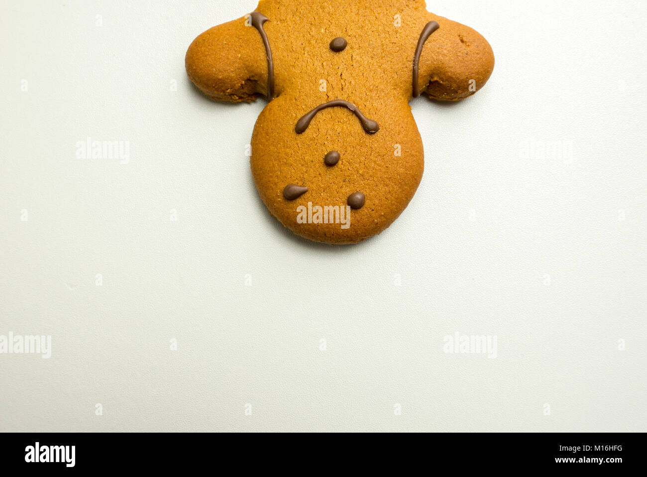 Home-Made Ginger Bread Man Cut In Half On A White Background Stock ...