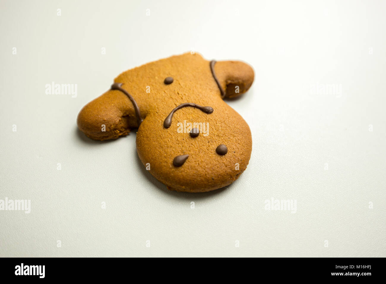 Home-Made Ginger Bread Man Cut In Half On A White Background Stock ...