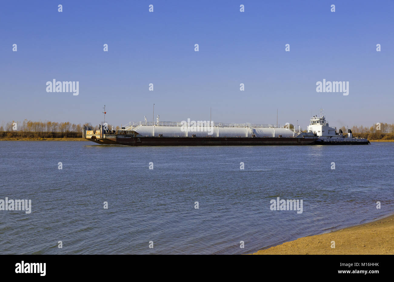 Barge with tanks for oil products floating on the river Stock Photo - Alamy