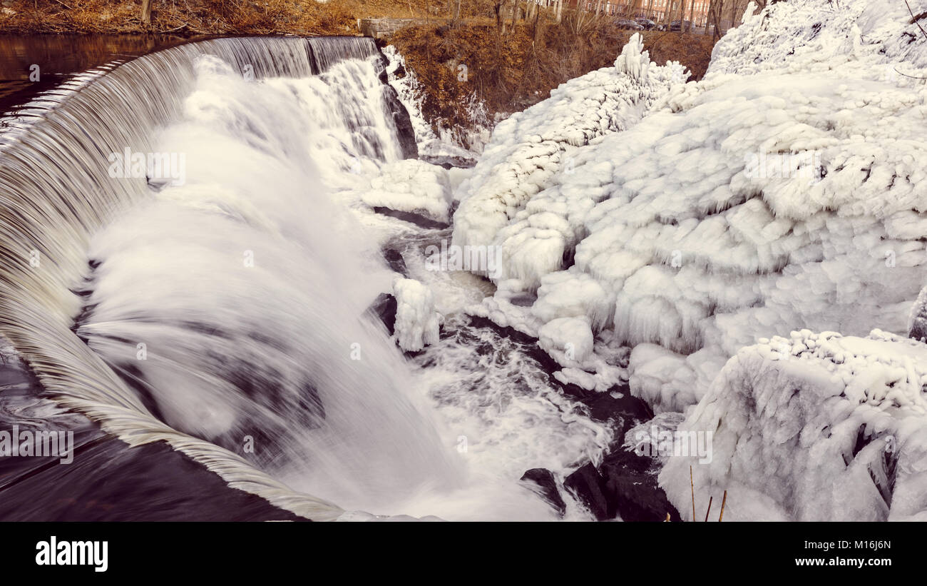 Winter water falls with ice build up. Photograph of the Yantic Falls in ...