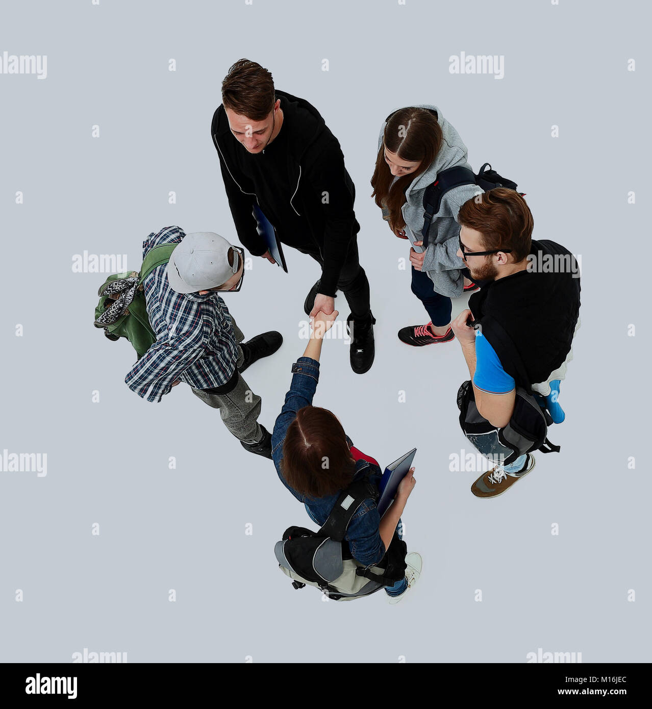 Top view. Happy smiling young group looking at camera Stock Photo - Alamy