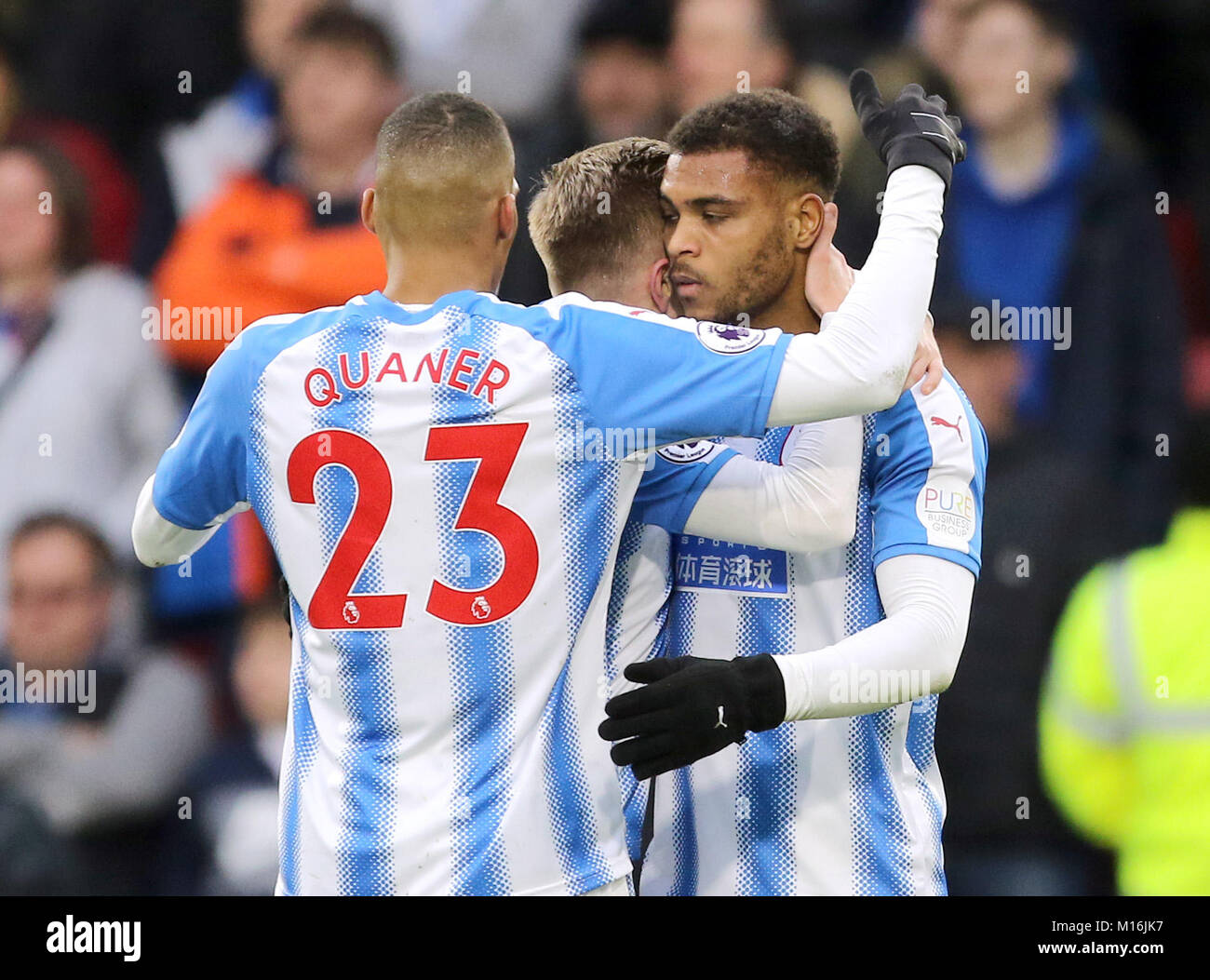 Huddersfield Town's Steve Mounie (right) celebrates scoring his side's ...