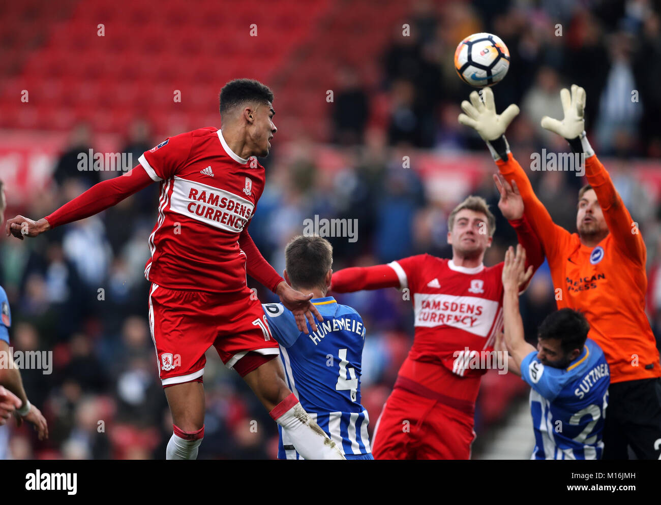Middlesbrough's Ashley Fletcher (left) attempts to head at goal as ...