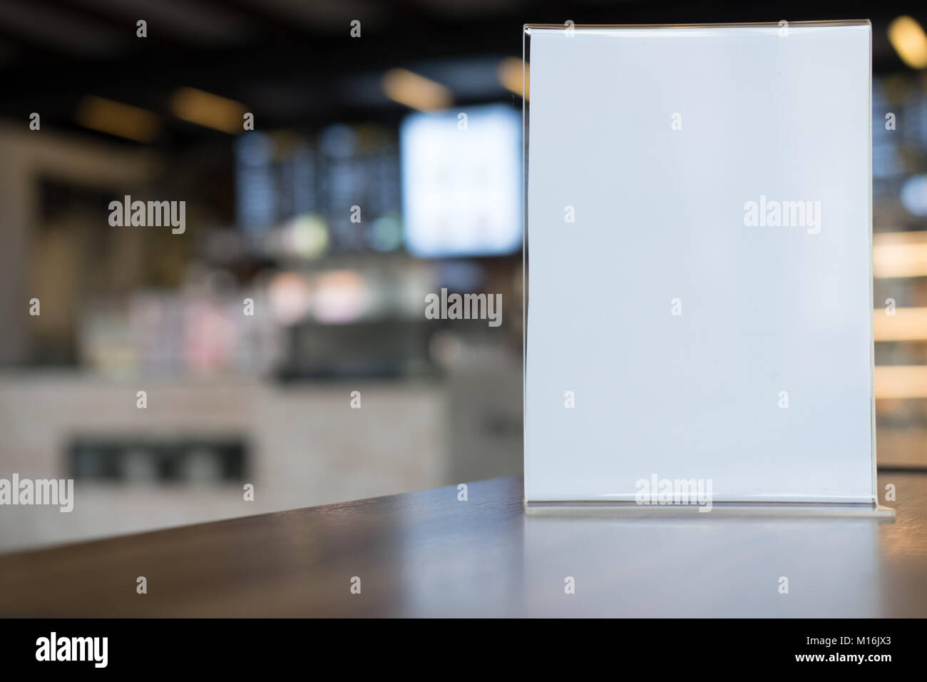 white label in cafe. display stand for acrylic tent card in coffee shop ...