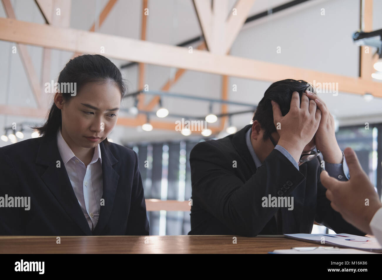 furious boss scolding frustrated woman at office. irritated man blames ...