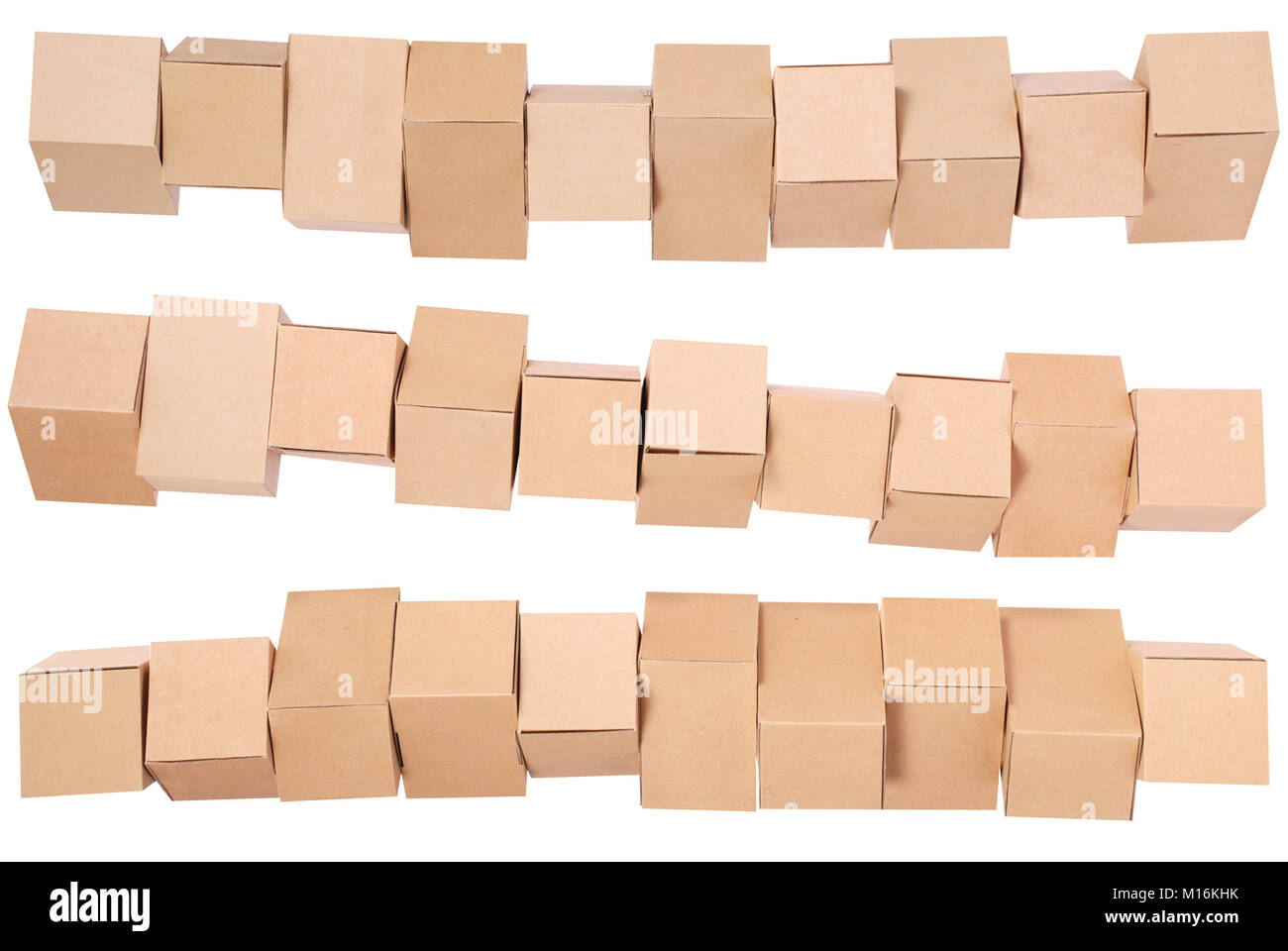 Three stacked cardboard boxes on white background Stock Photo - Alamy