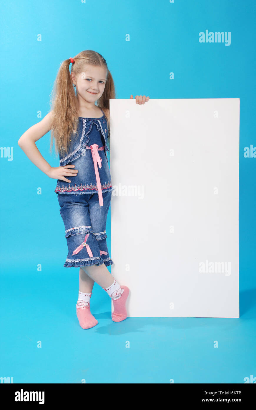 The girl holds white board Stock Photo - Alamy