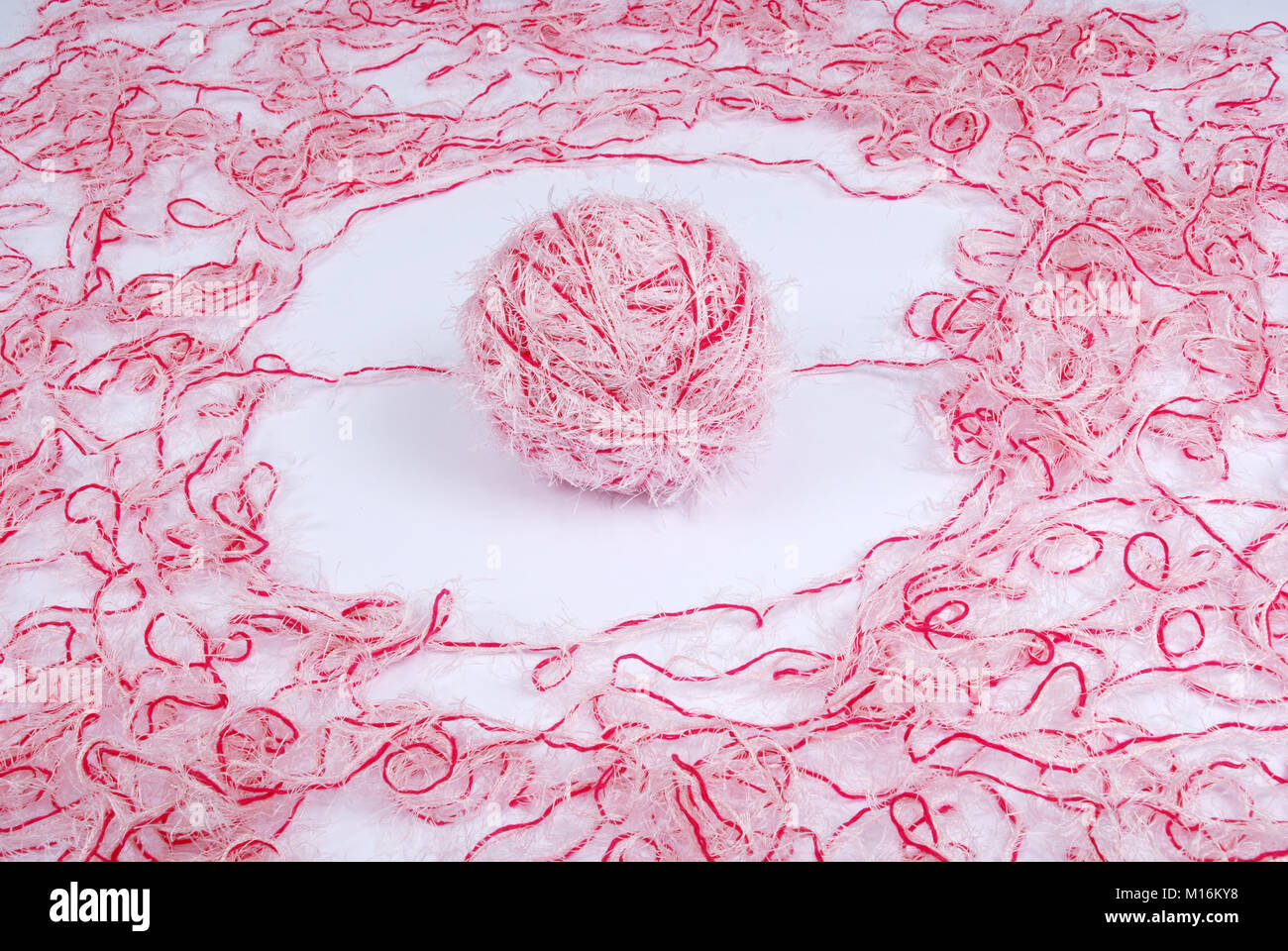 red and white threads clew isolated on a white background Stock Photo ...