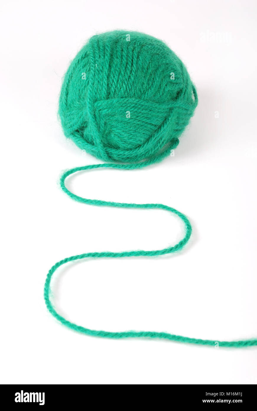 green threads clew isolated on a white background Stock Photo - Alamy