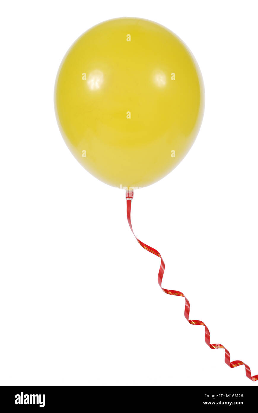 Yellow balloon isolated on white background Stock Photo - Alamy