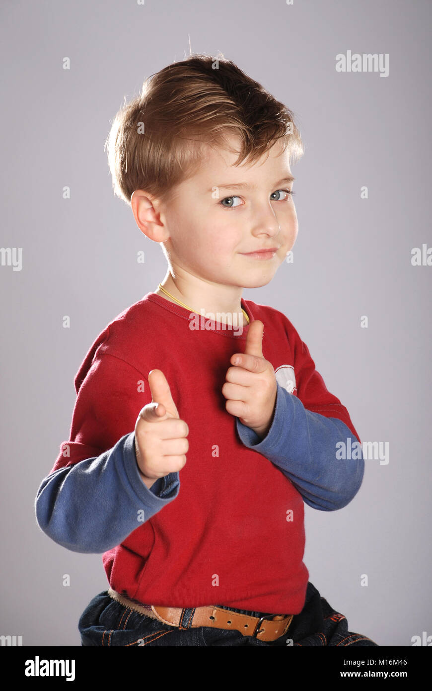 Portrait of young boy, studio shot Stock Photo - Alamy