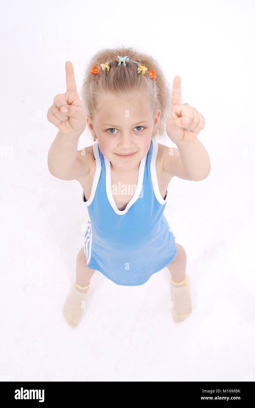 Girl shows one fingers. Top view. Isolated on white background Stock ...