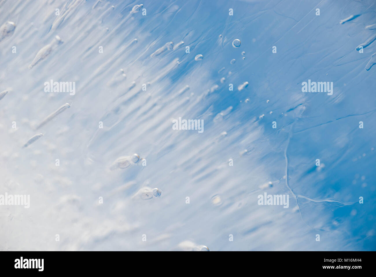 winter blue color ice background texture macro Stock Photo - Alamy