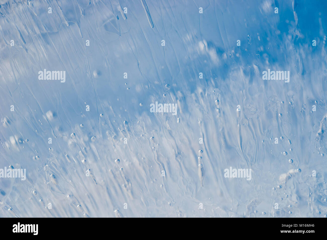 winter blue color ice background texture macro Stock Photo - Alamy