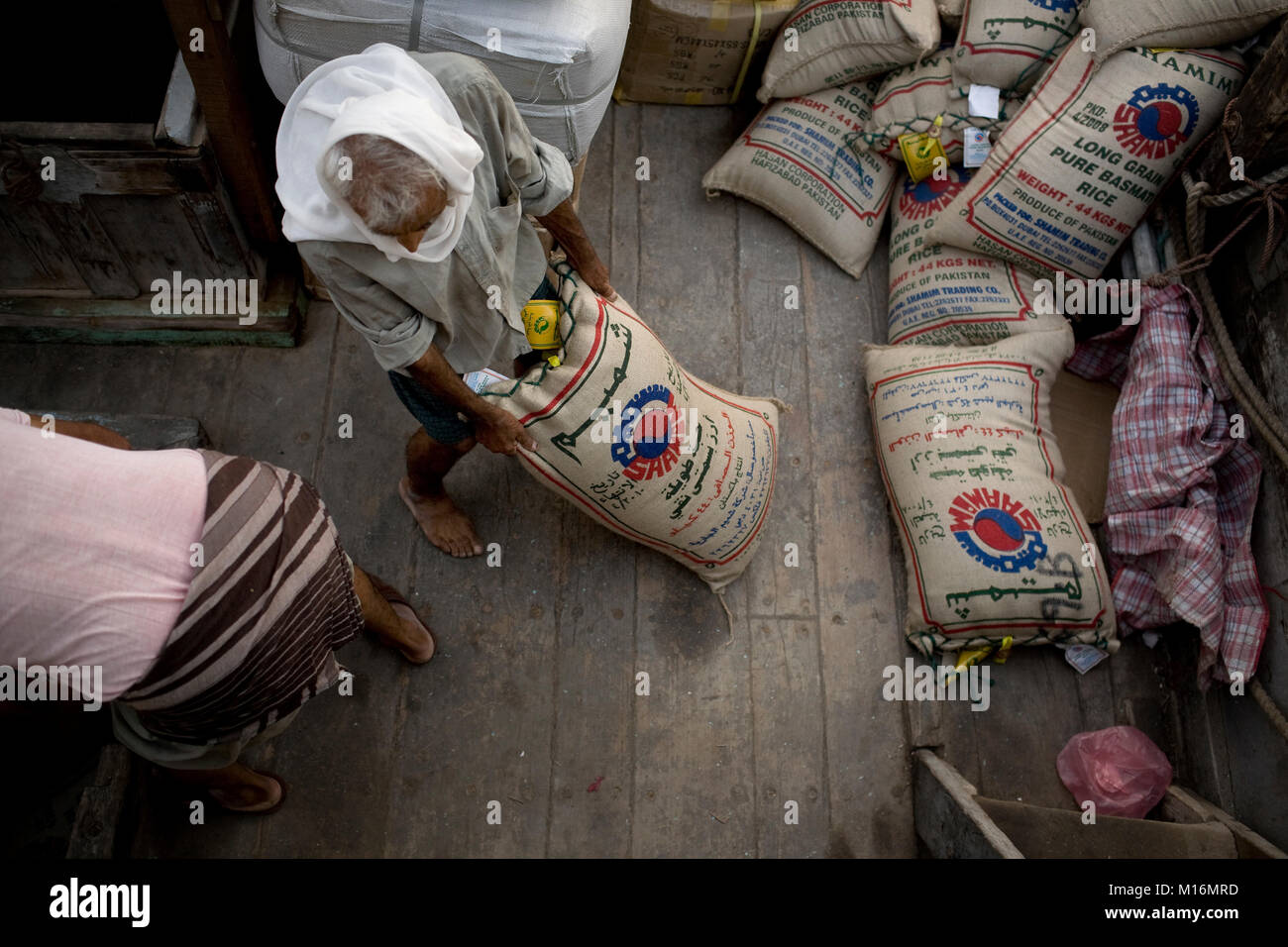 DUBAI, UNITED ARAB EMIRATES - October 17, 2008: Basmati rice is loaded ...