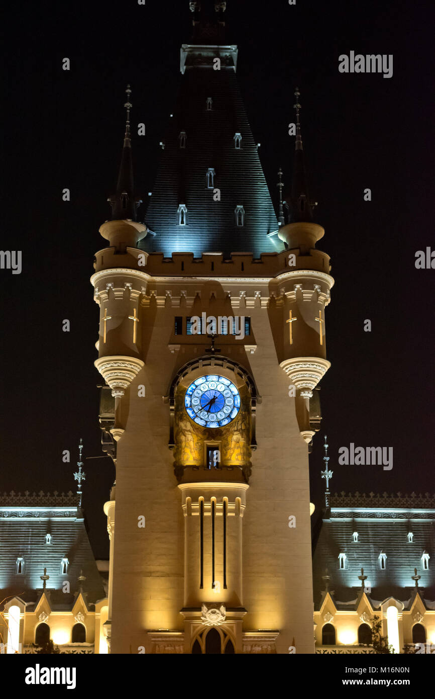 Old gothic palace with clock tower - architectural details, at night ...