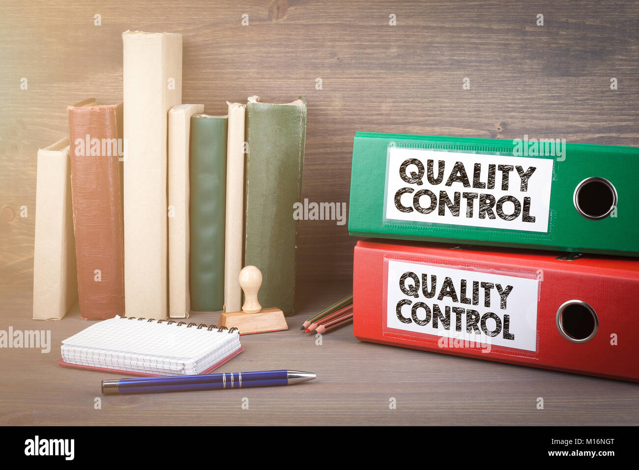 Quality Control. Binders on desk in the office. Business background ...