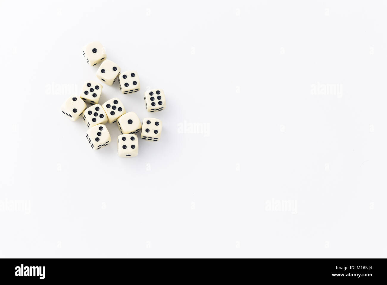 dice scattered on a light background Stock Photo - Alamy