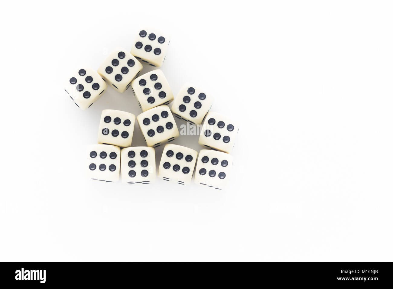 dice scattered on a light background, only sixes Stock Photo - Alamy