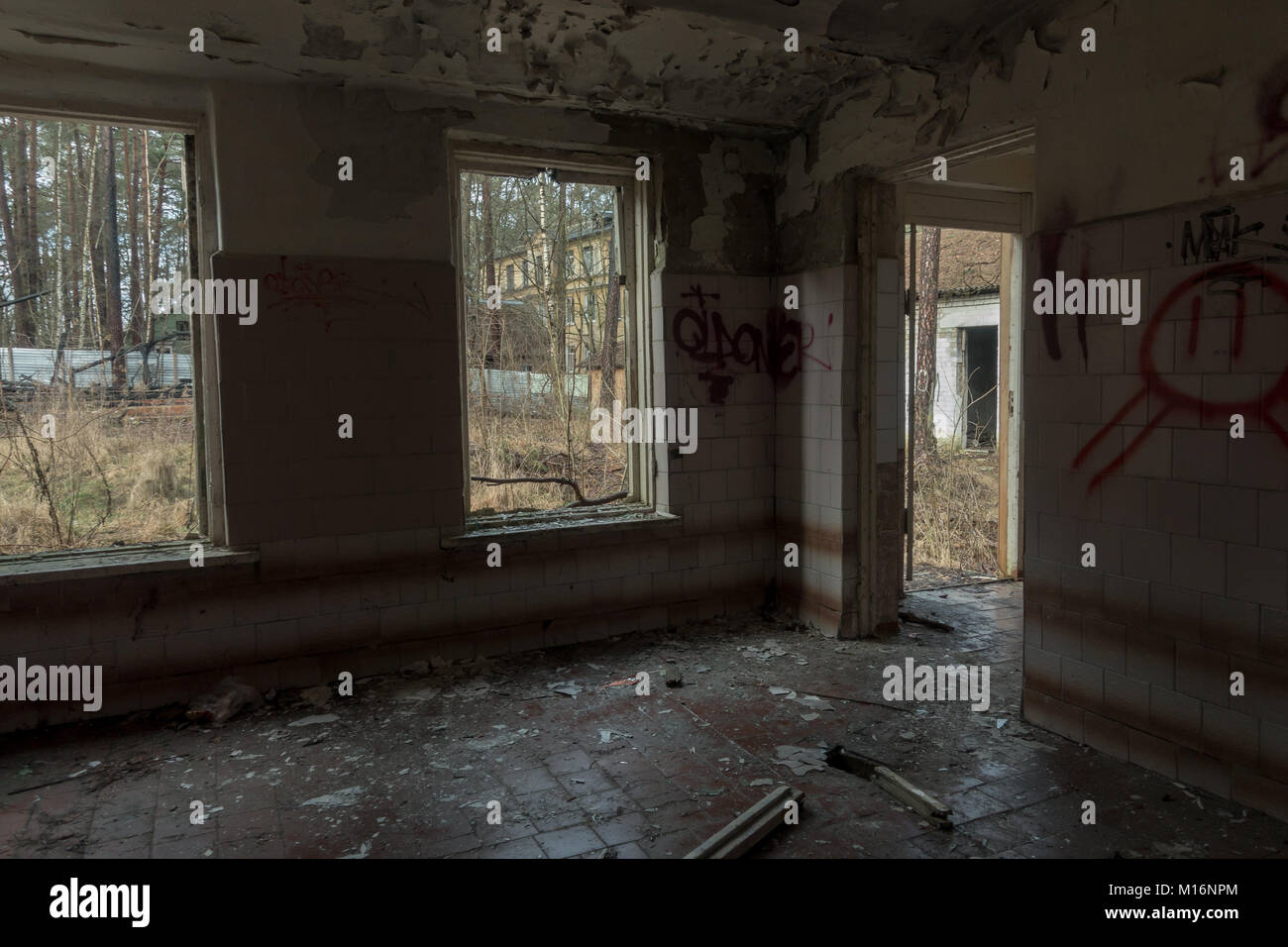 Interior of an abandoned building broken windows Stock Photo - Alamy