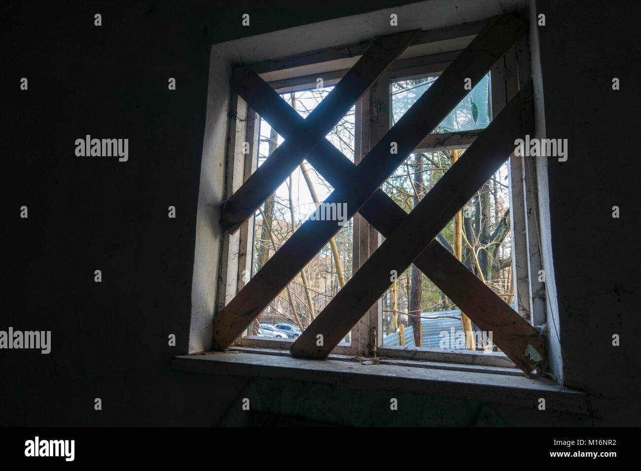 Interior of an abandoned building broken windows Stock Photo - Alamy