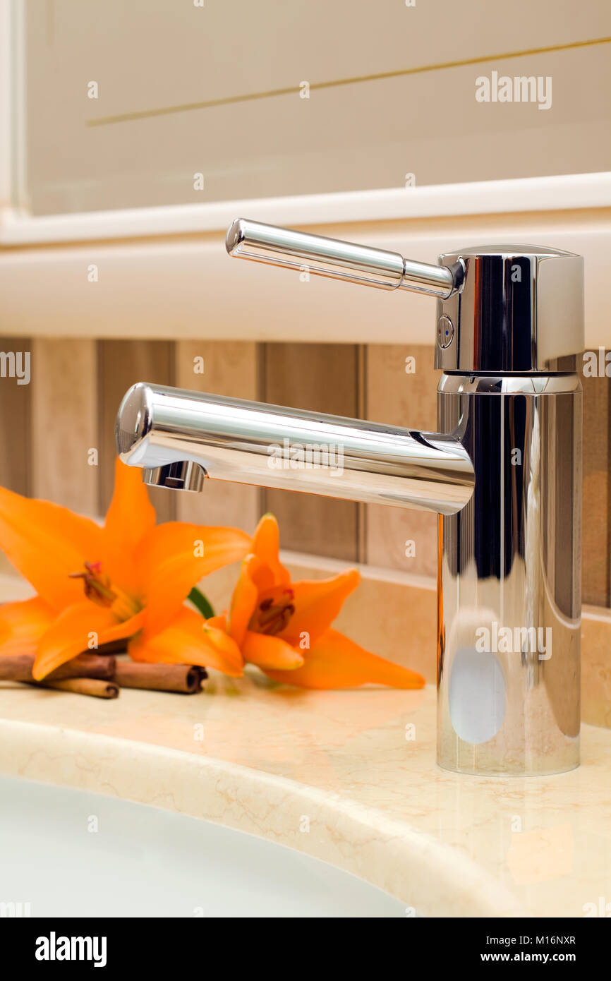 faucet inside beautiful bathroom Stock Photo - Alamy