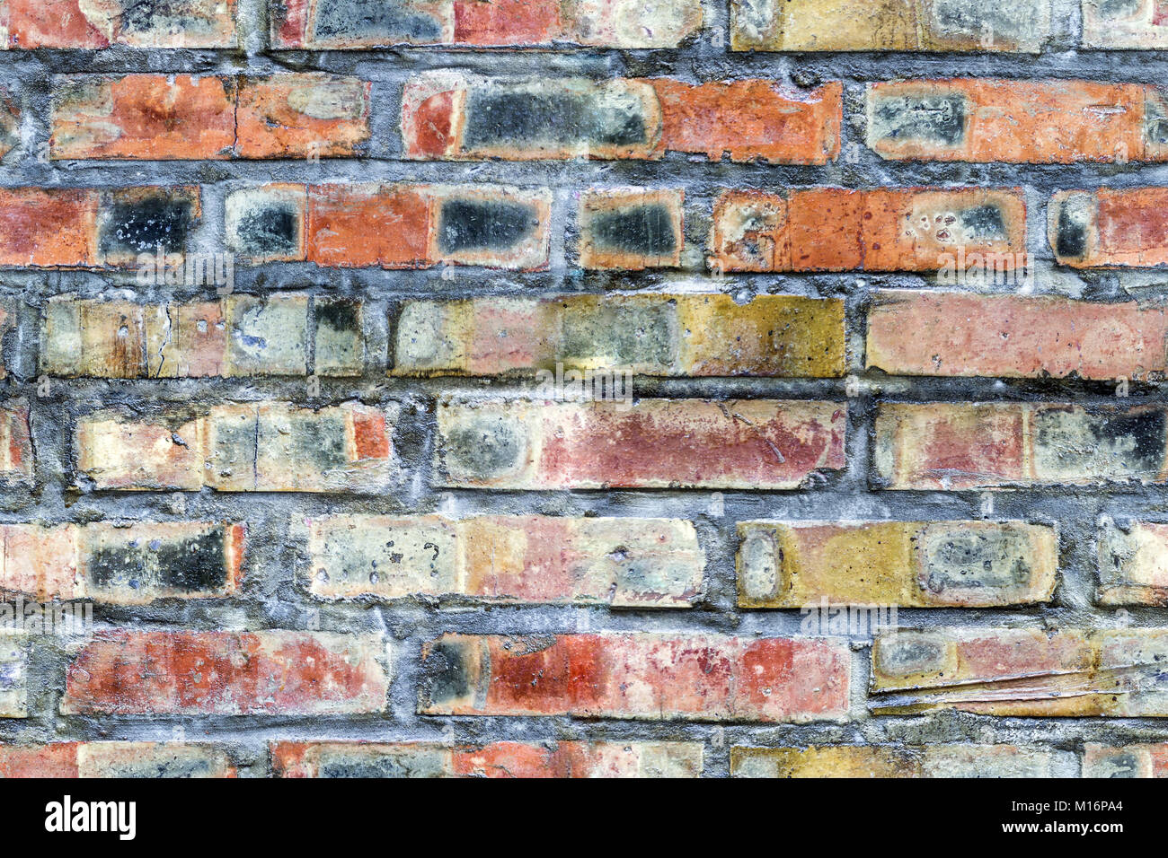 Seamless texture of old cracked weathered colored ruined brick wall ...
