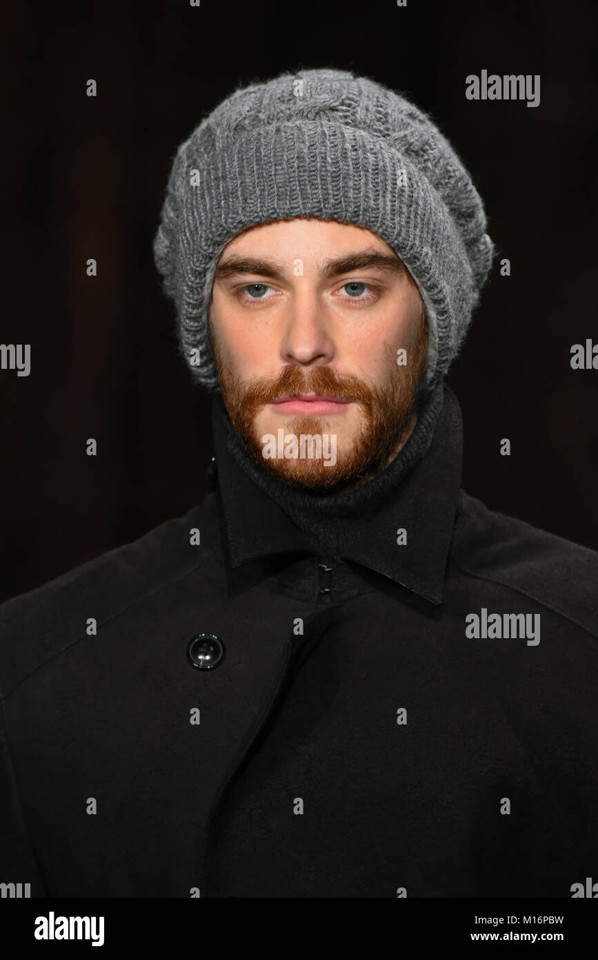 NEW YORK, NY - JANUARY 26: Model walks the runway wearing John Varvatos ...