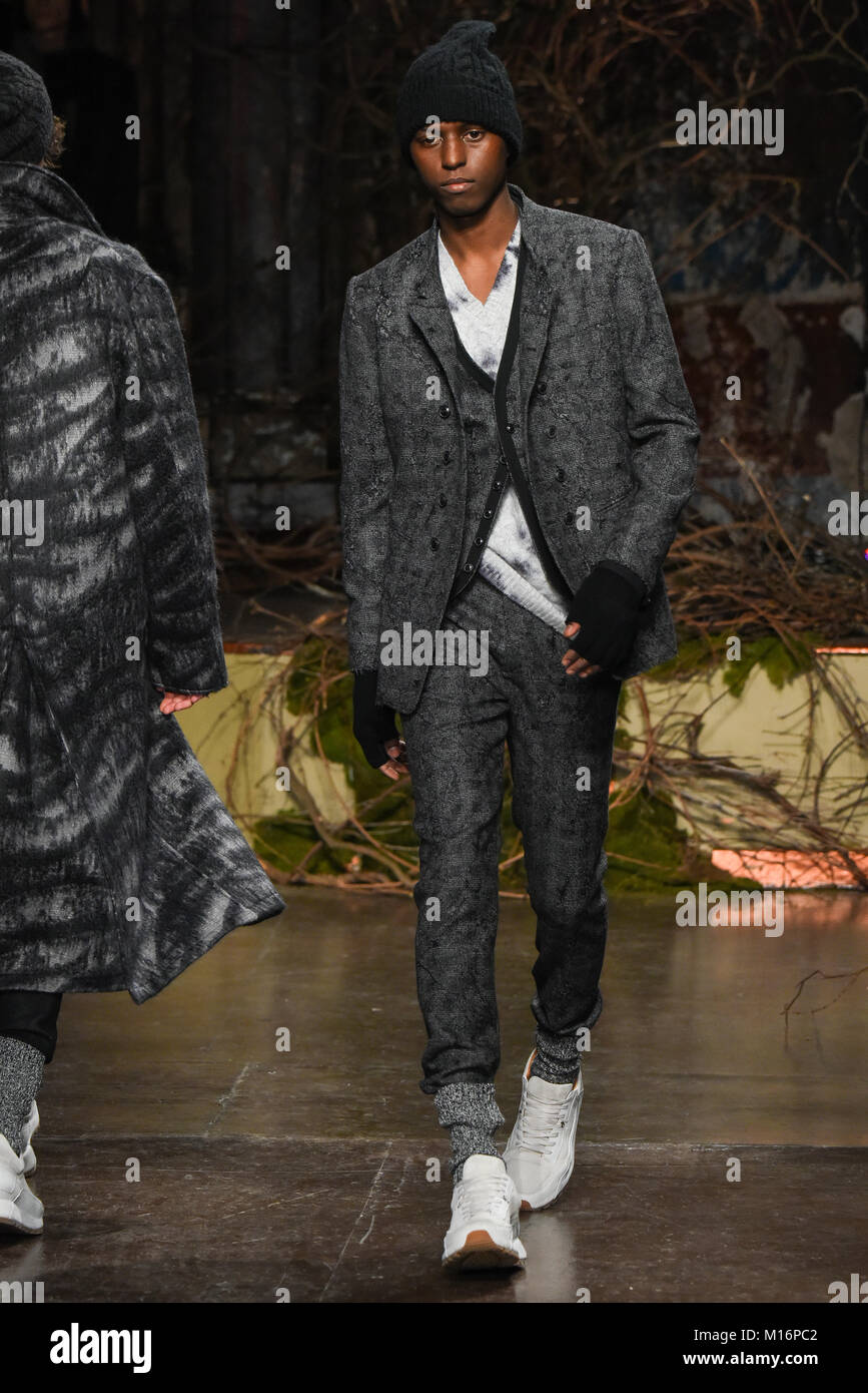 NEW YORK, NY - JANUARY 26: Model walks the runway wearing John Varvatos ...