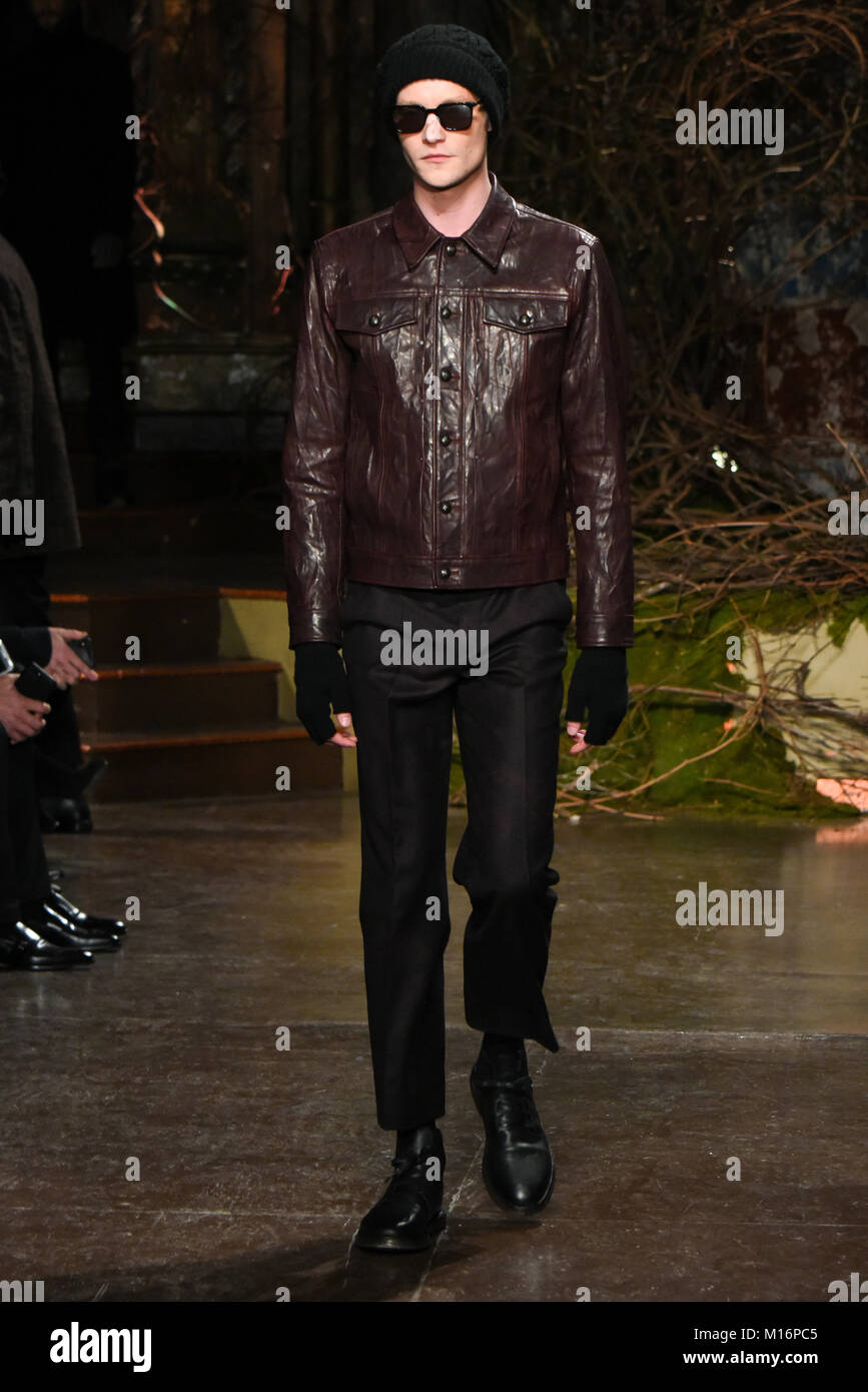 NEW YORK, NY - JANUARY 26: Model walks the runway wearing John Varvatos ...