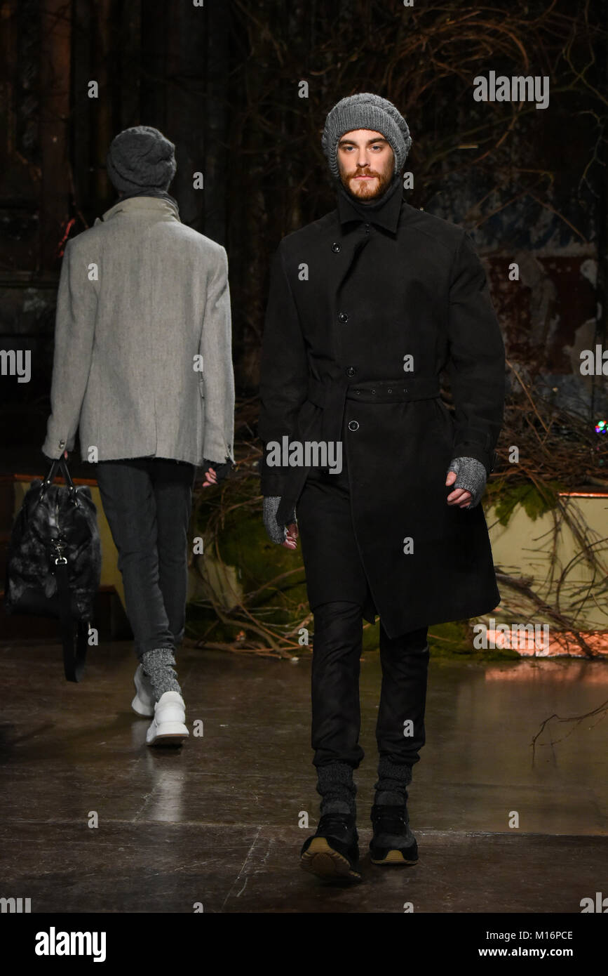 NEW YORK, NY - JANUARY 26: Model walks the runway wearing John Varvatos ...