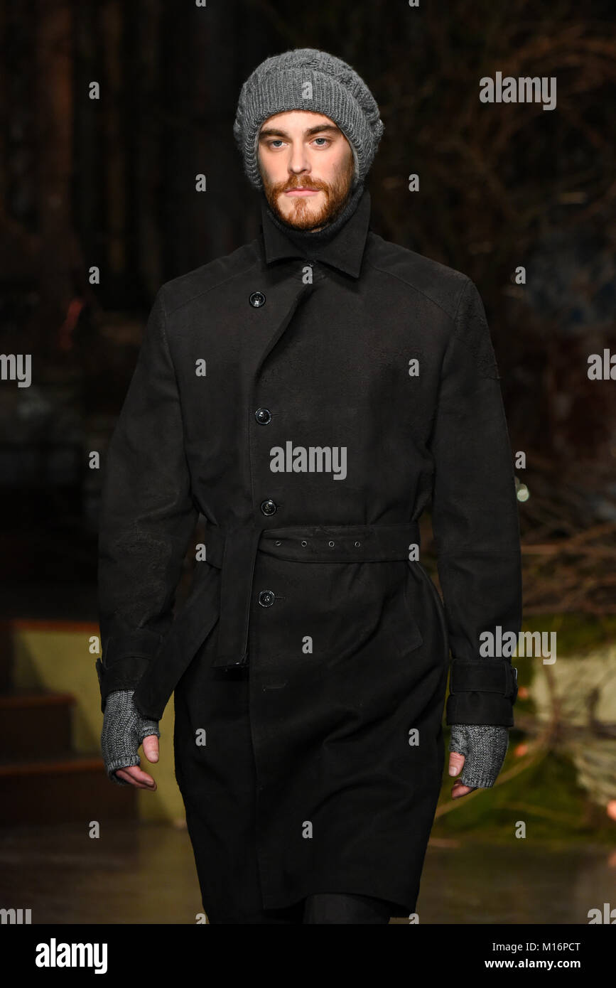 NEW YORK, NY - JANUARY 26: Model walks the runway wearing John Varvatos ...
