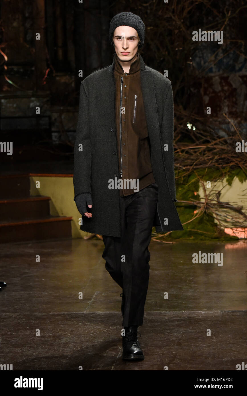 NEW YORK, NY - JANUARY 26: Model walks the runway wearing John Varvatos ...