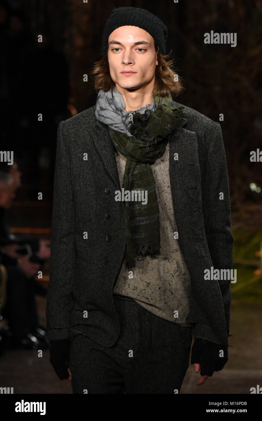 NEW YORK, NY - JANUARY 26: Model walks the runway wearing John Varvatos ...