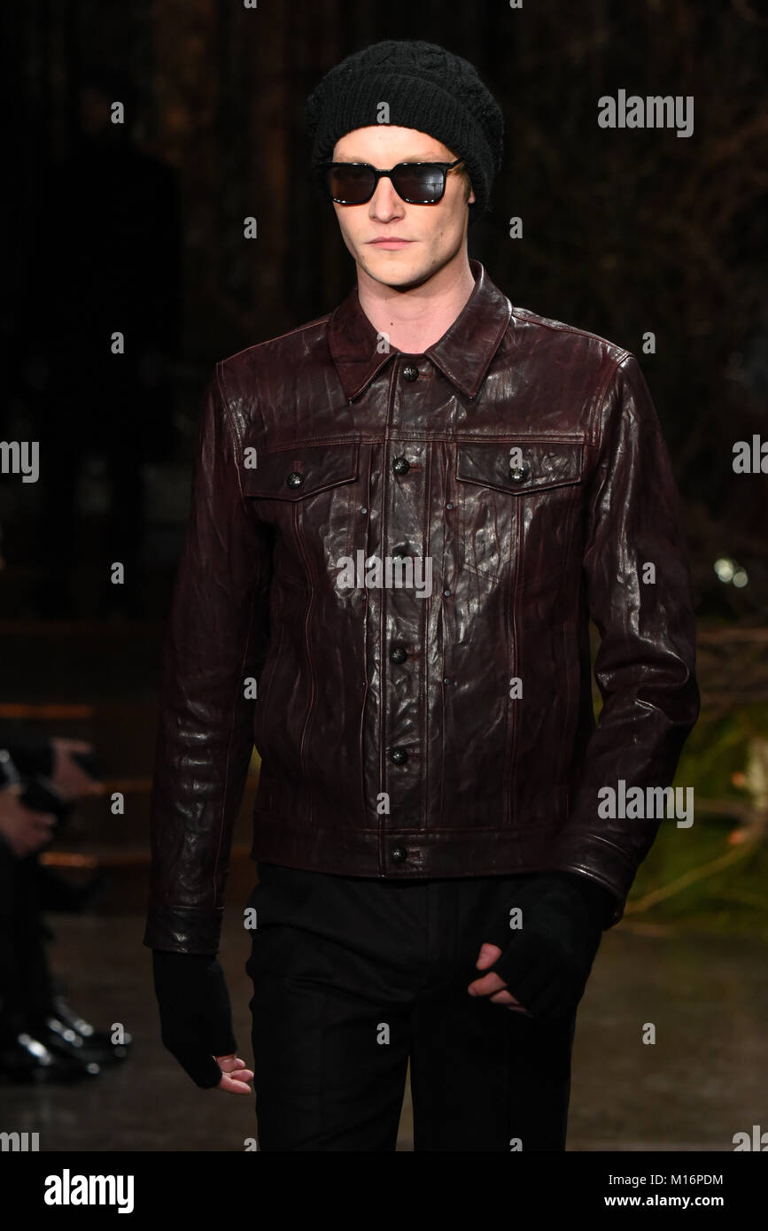 NEW YORK, NY - JANUARY 26: Model walks the runway wearing John Varvatos ...