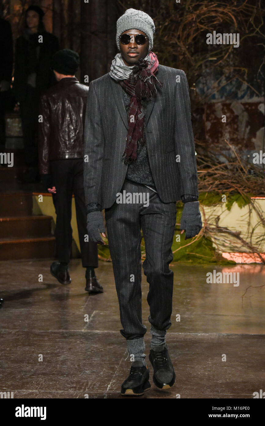 NEW YORK, NY - JANUARY 26: Model walks the runway wearing John Varvatos ...