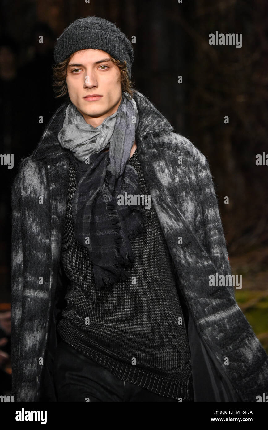 NEW YORK, NY - JANUARY 26: Model walks the runway wearing John Varvatos ...