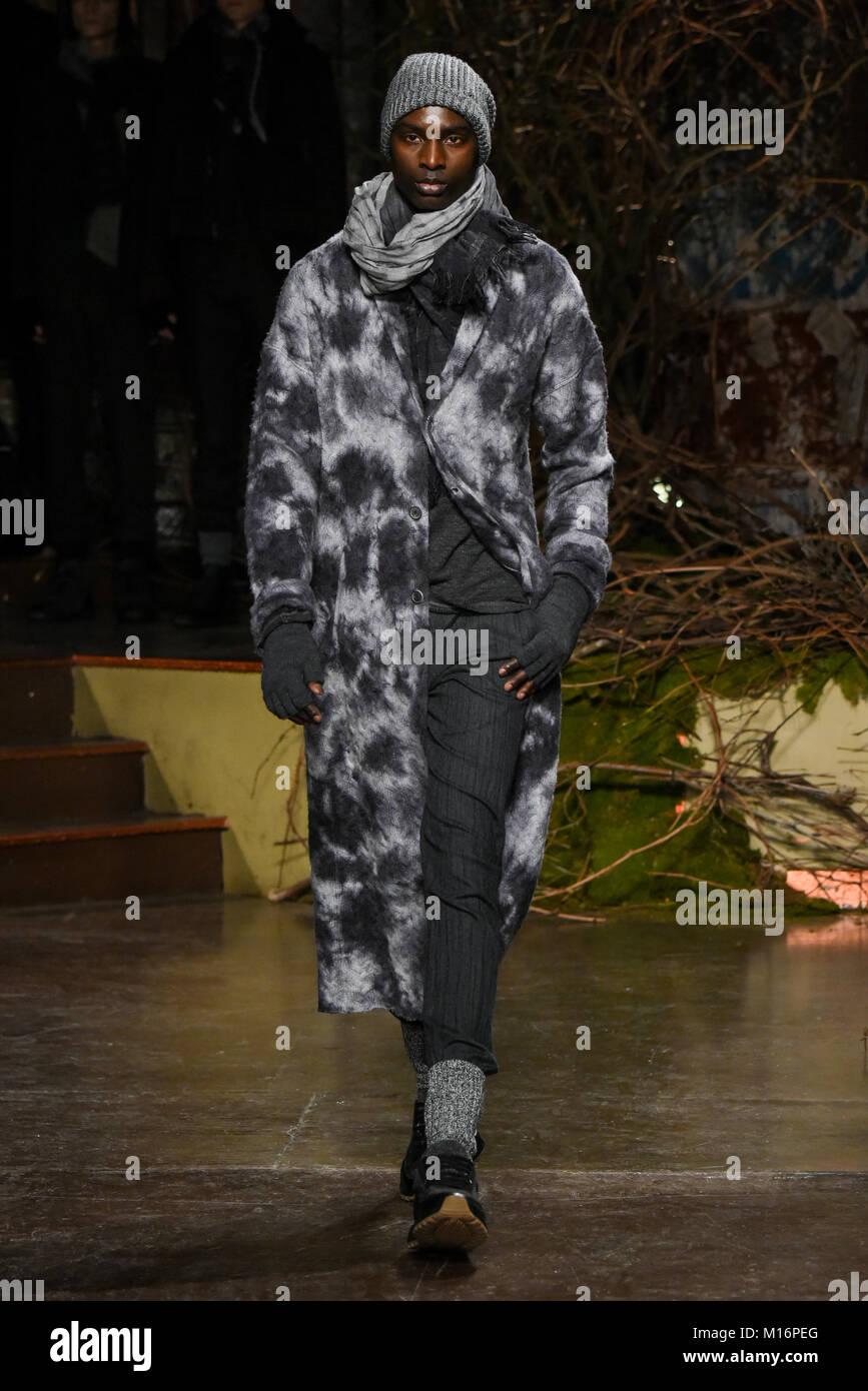 NEW YORK, NY - JANUARY 26: Model walks the runway wearing John Varvatos ...