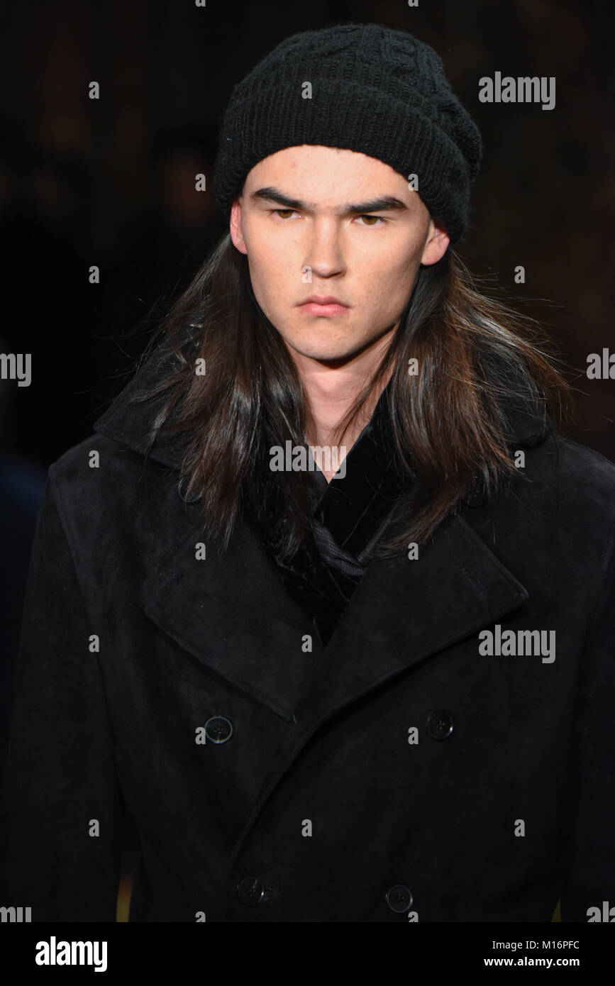 NEW YORK, NY - JANUARY 26: Model walks the runway wearing John Varvatos ...