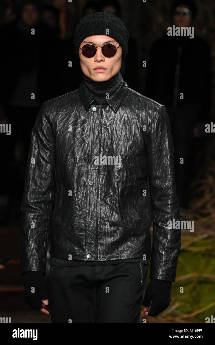 NEW YORK, NY - JANUARY 26: Model walks the runway wearing John Varvatos ...