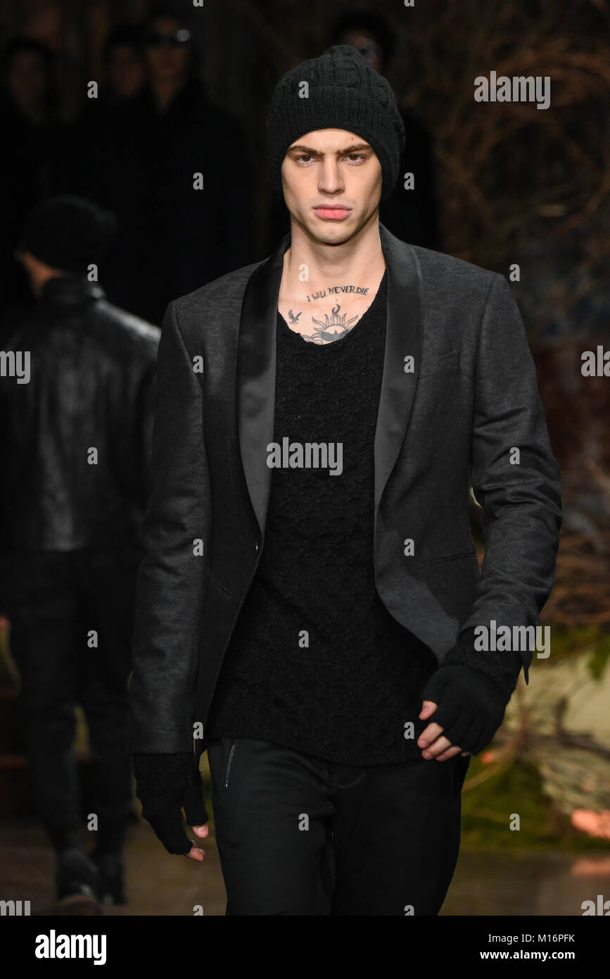 NEW YORK, NY - JANUARY 26: Model walks the runway wearing John Varvatos ...