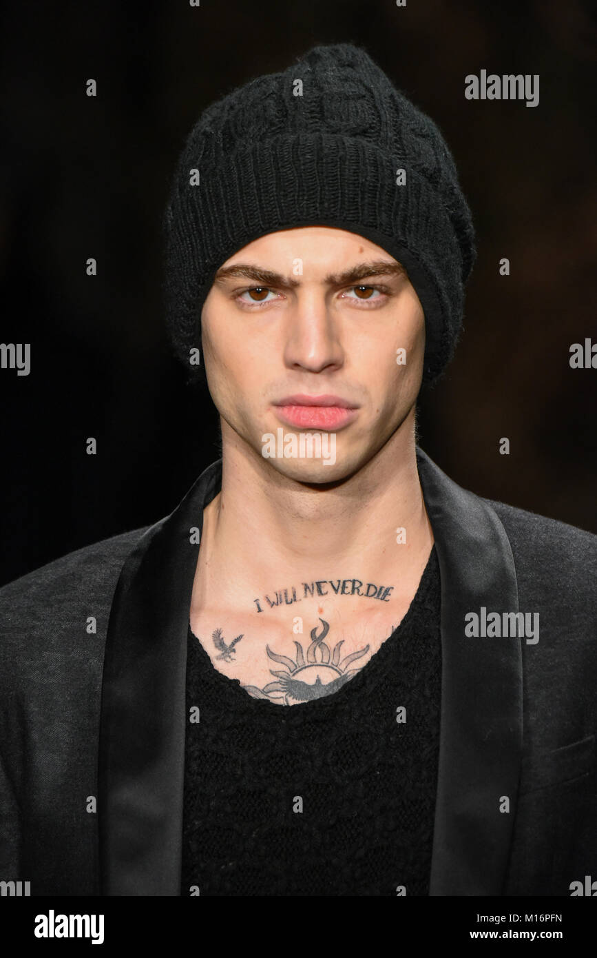 NEW YORK, NY - JANUARY 26: Model walks the runway wearing John Varvatos ...