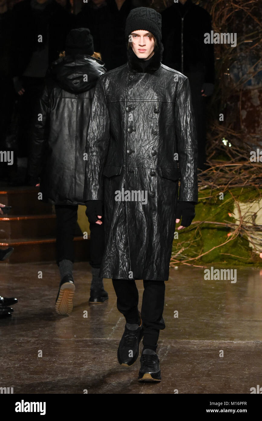 NEW YORK, NY - JANUARY 26: Model walks the runway wearing John Varvatos ...