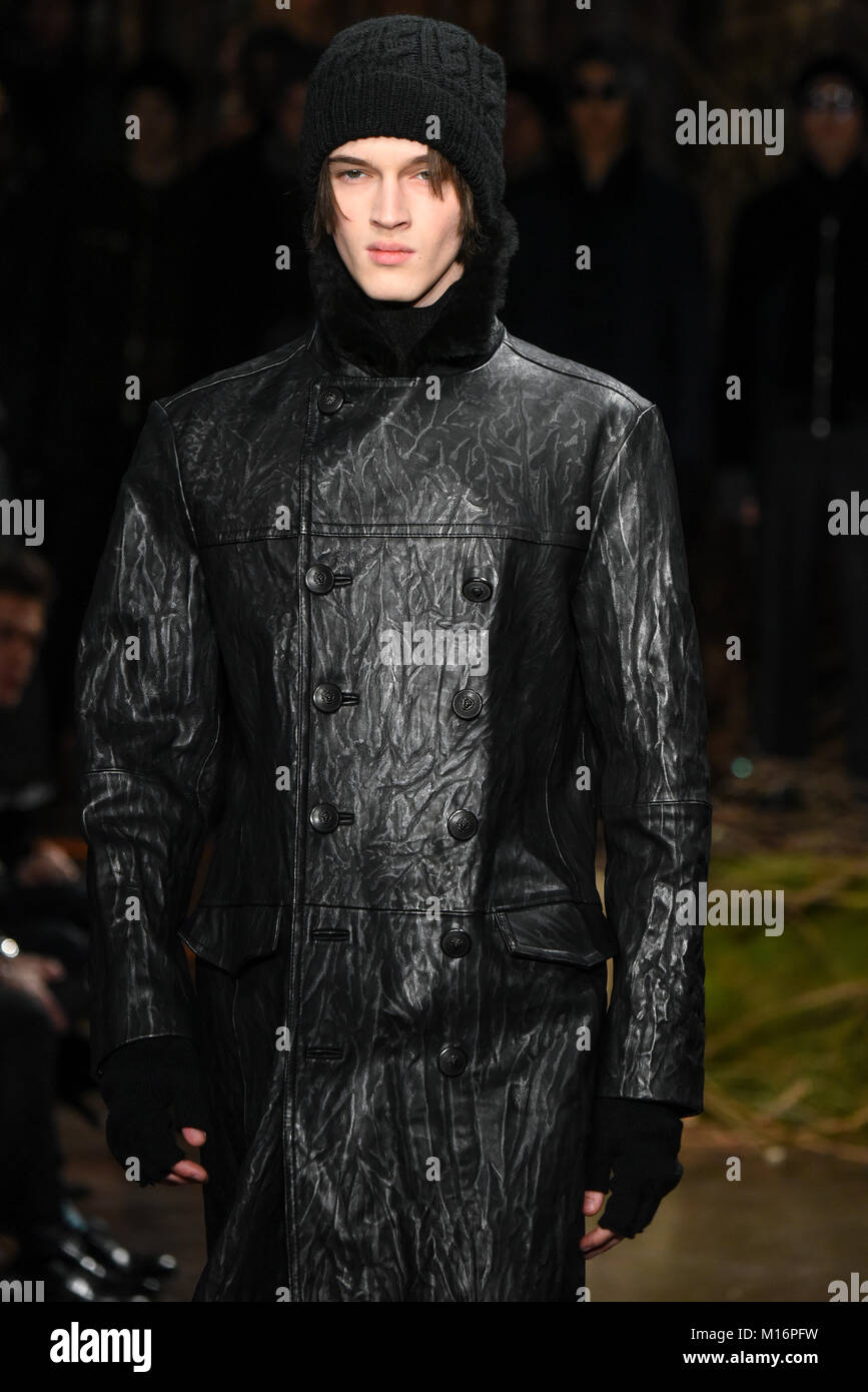 NEW YORK, NY - JANUARY 26: Model walks the runway wearing John Varvatos ...