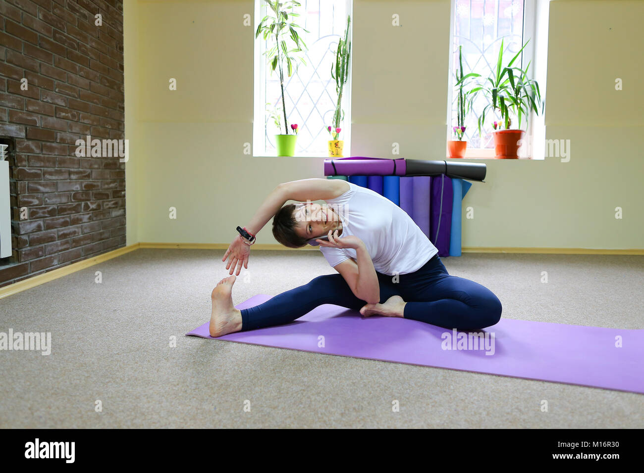 Young woman of American appearance performs asanas from yoga Stock ...