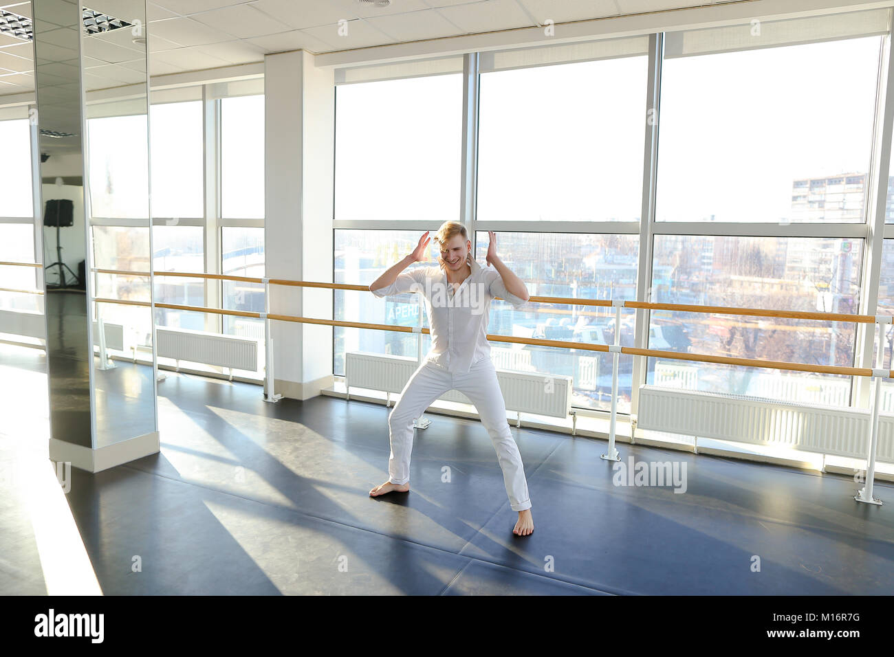 Guy making break dance movements Stock Photo - Alamy