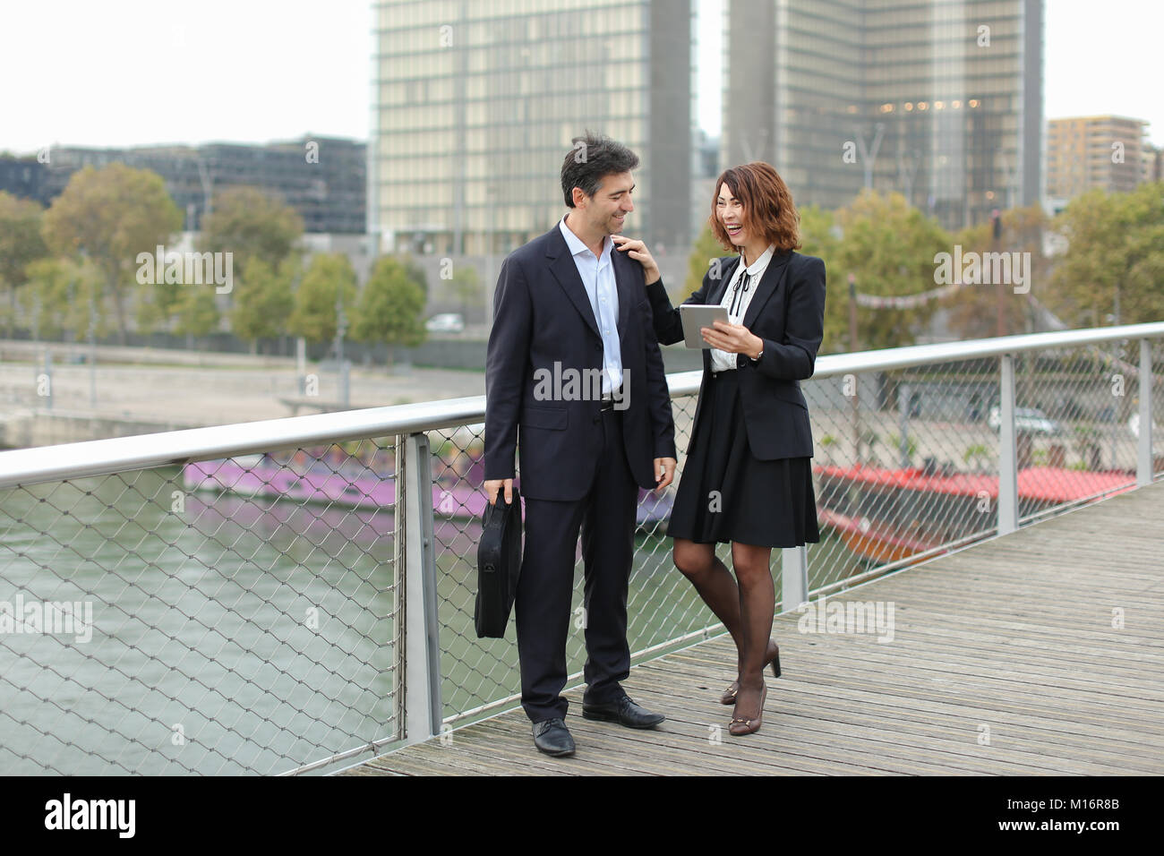 Married business couple make purchases by credit card Stock Photo - Alamy