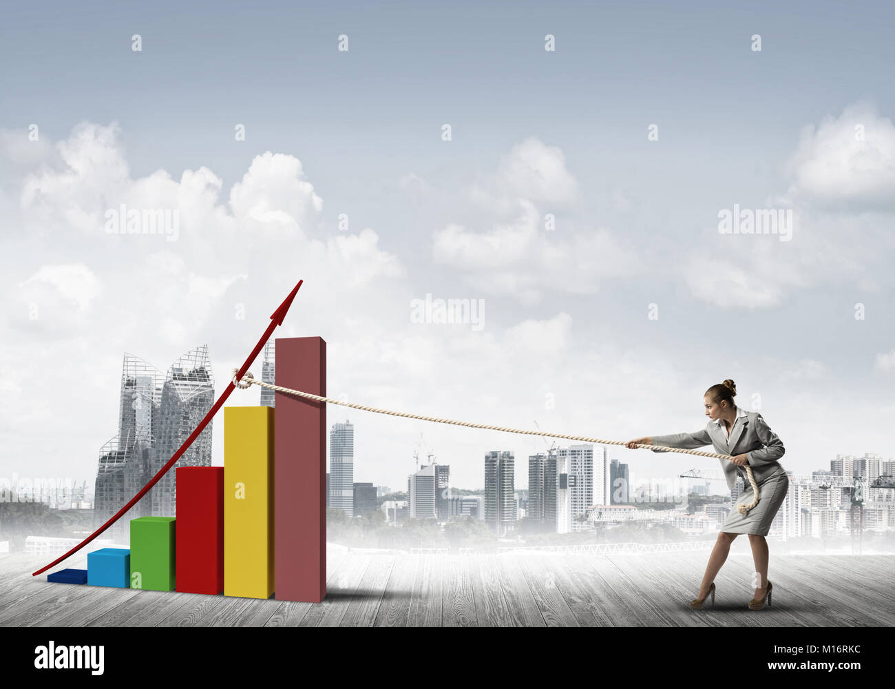 Businesswoman pulling graph with rope as concept of power and control ...