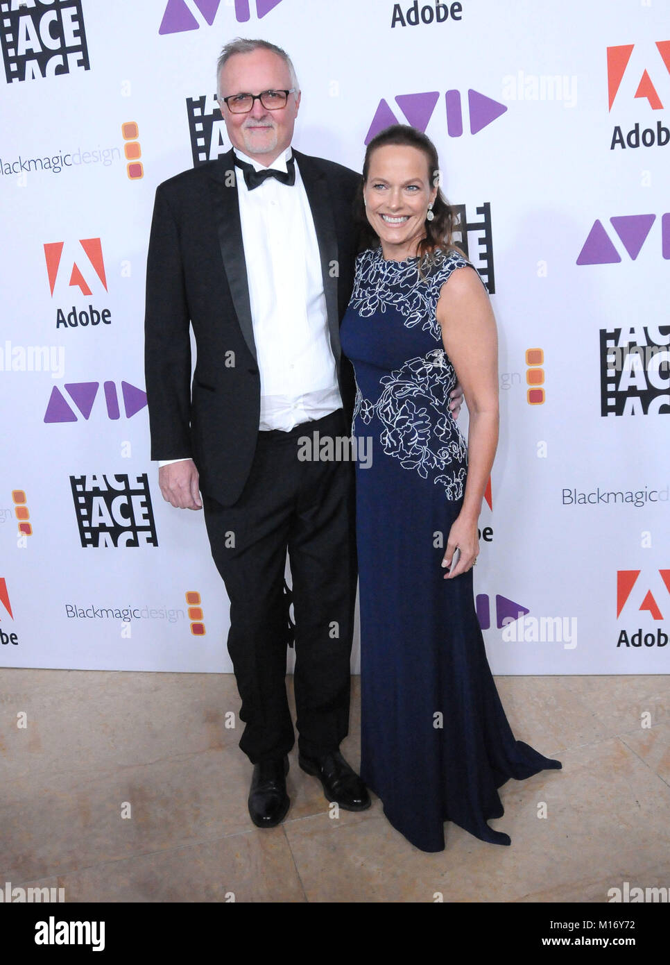 BEVERLY HILLS, CA - JANUARY 26: (L-R) Editor Lee Smith and wife ...